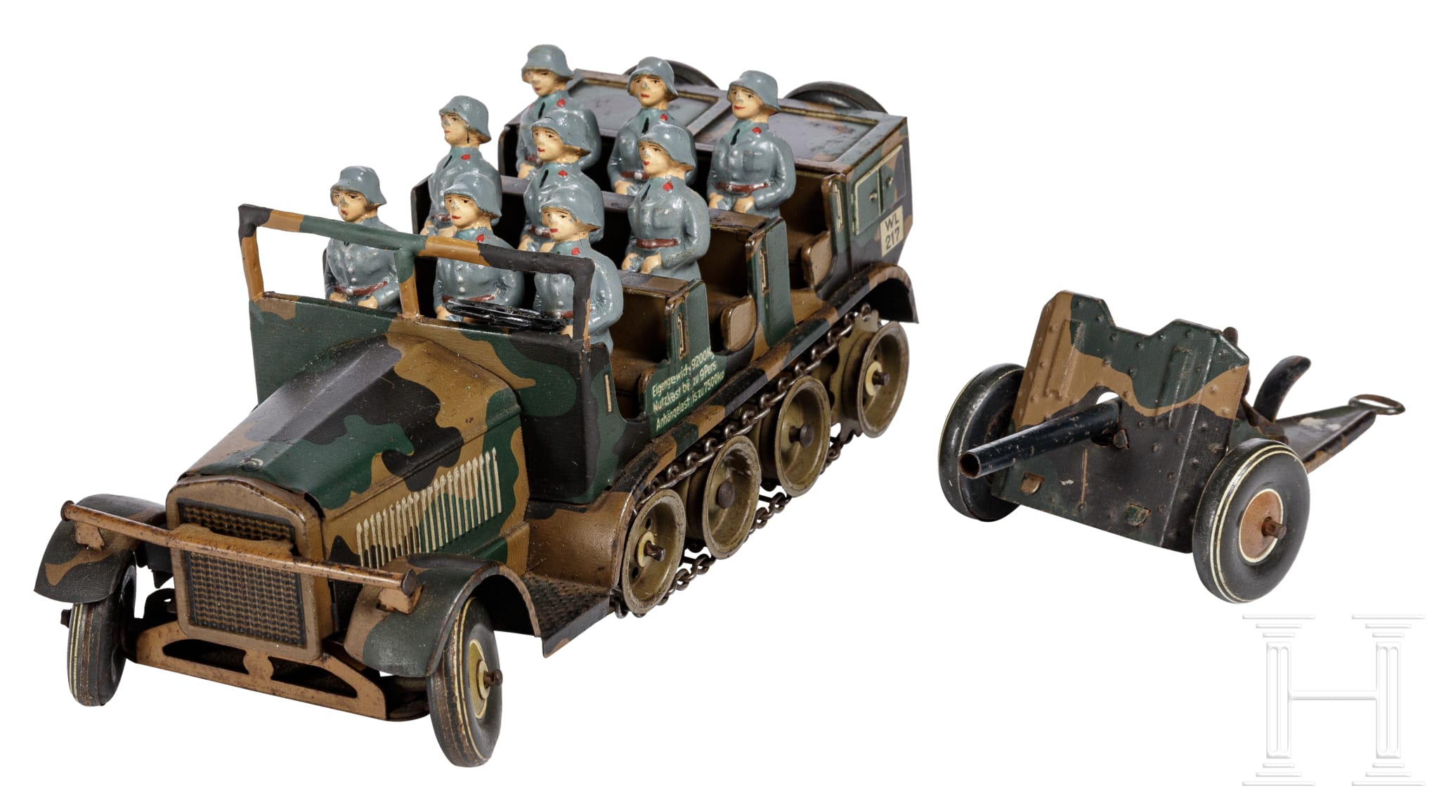 A TippCo half-track WL 217 with nine sitting soldiers and an anti tank ...
